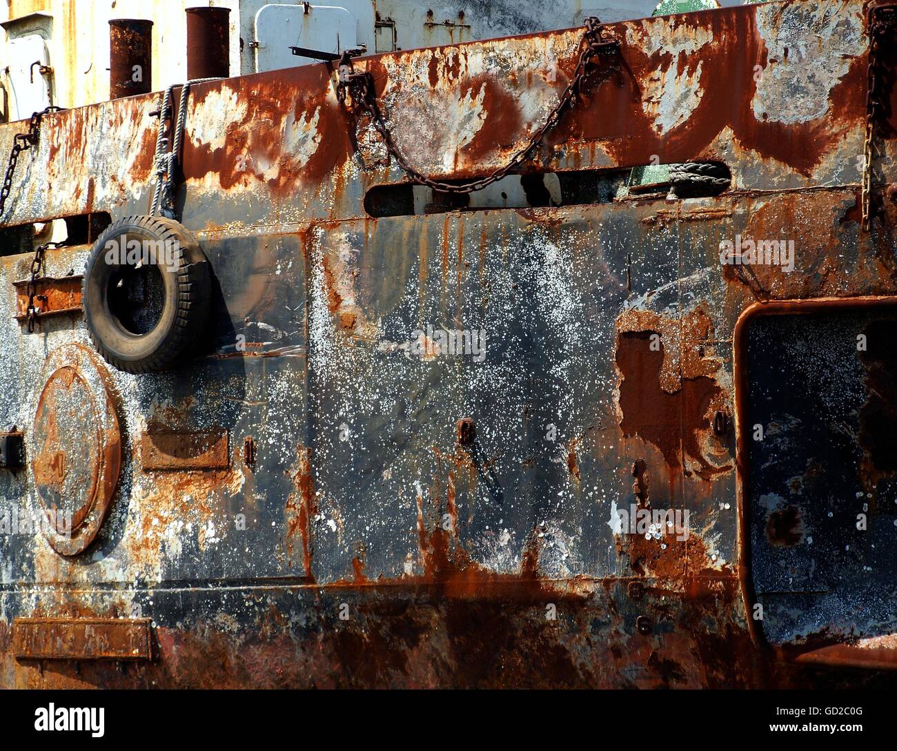 An old fishing boat that is decaying with rust Stock Photo - Alamy