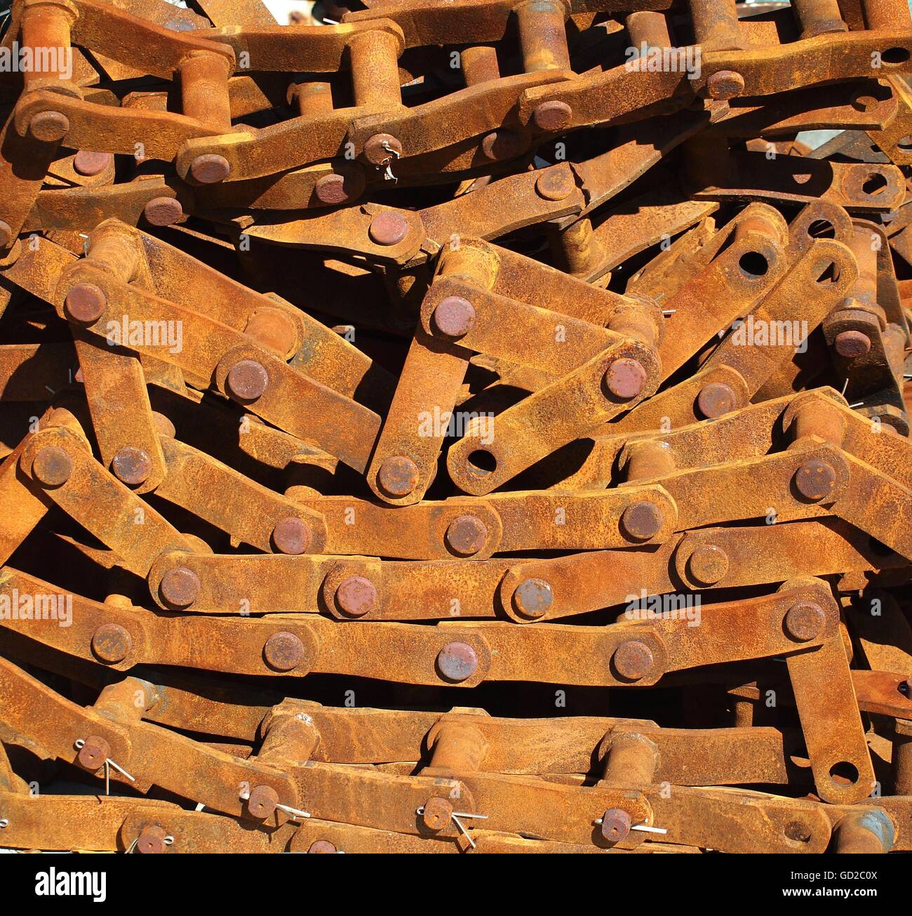 A rusty old chain link system that was part of a continuous track Stock ...