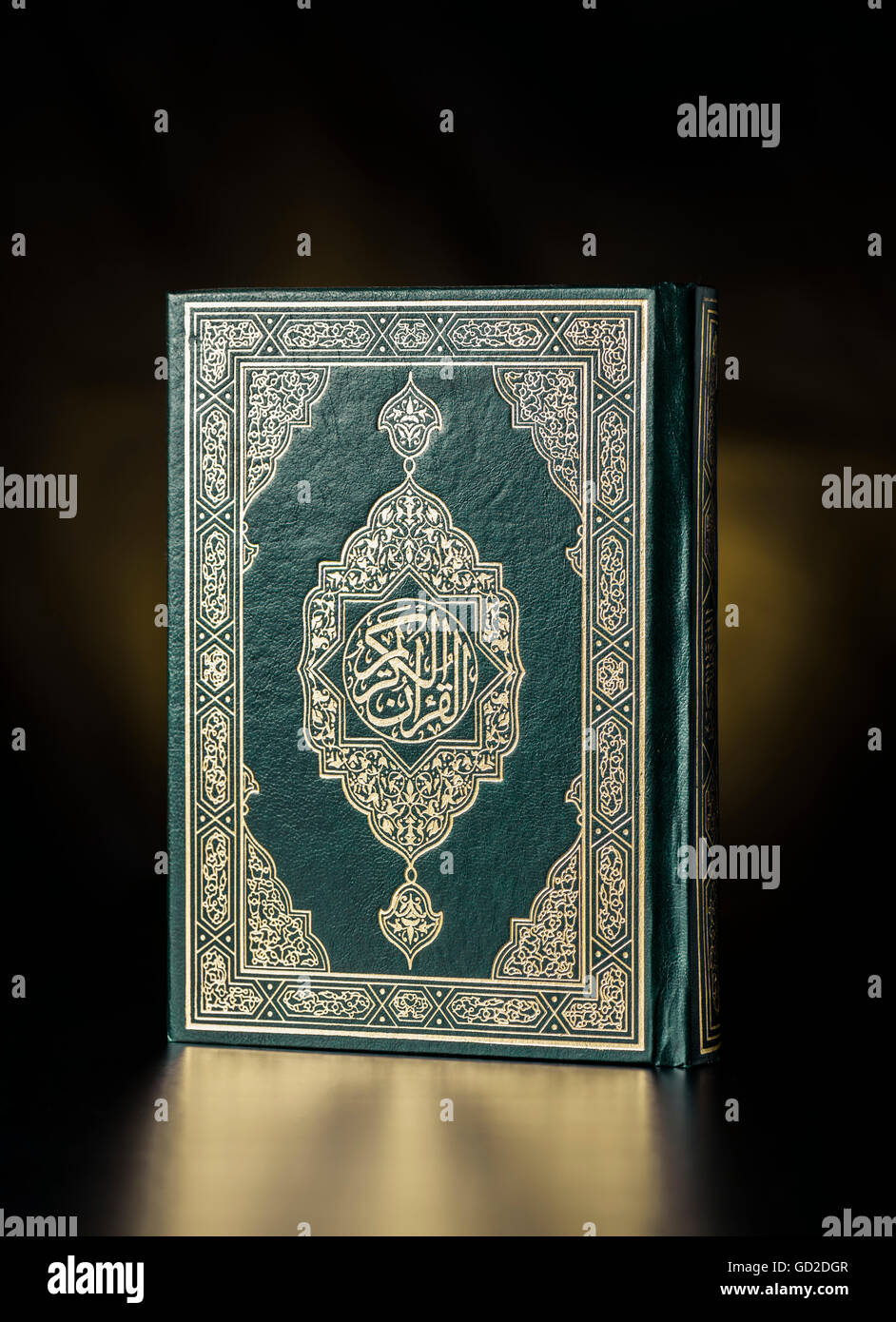 Closed Islamic Book Holy Quran on Black Background Stock Photo - Alamy