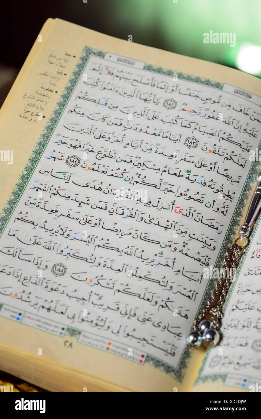 Islamic Book Holy Quran Open on Ramadan Aya Page Stock Photo - Alamy