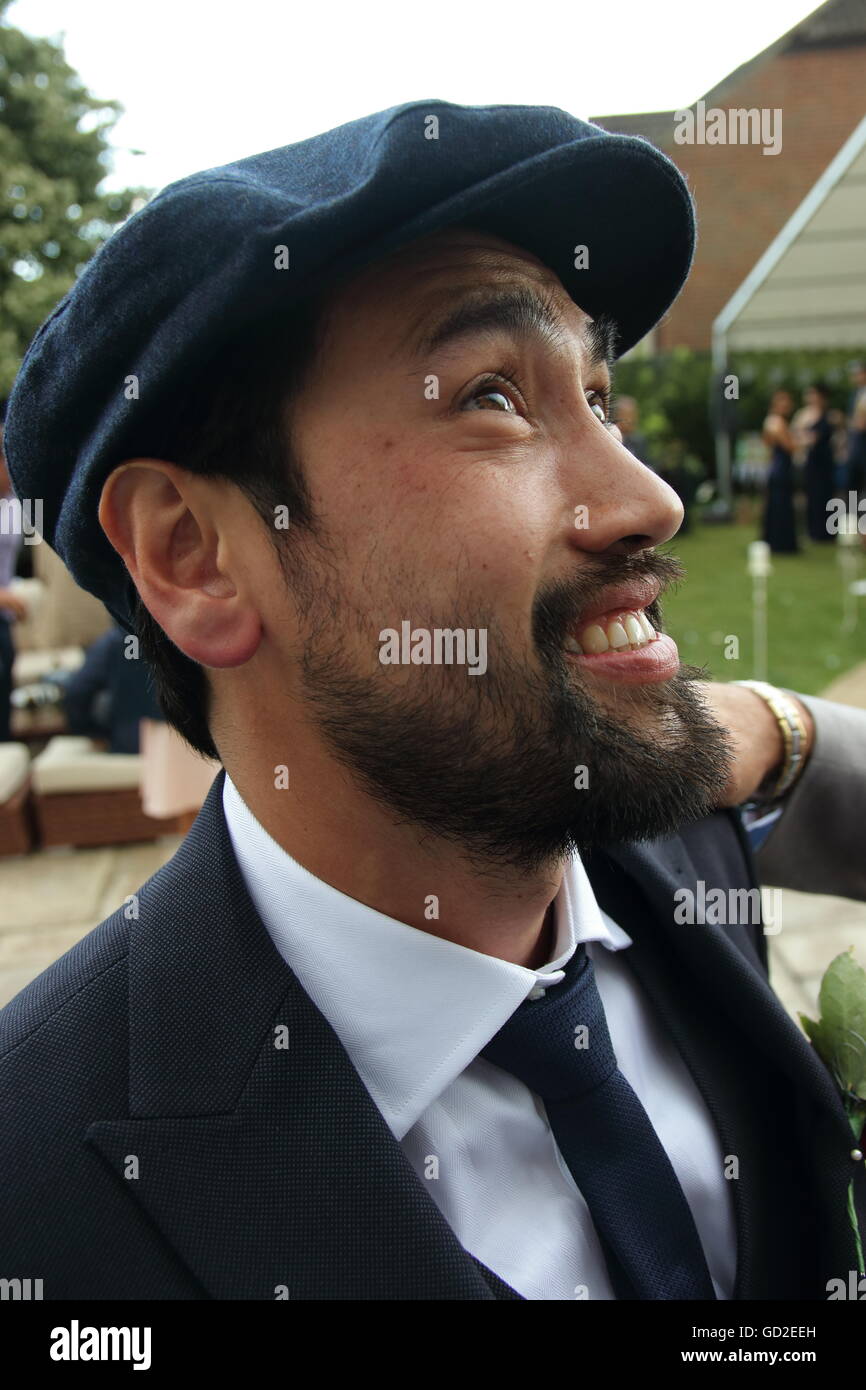 Man wearing flat cap smiling hi-res stock photography and images - Alamy
