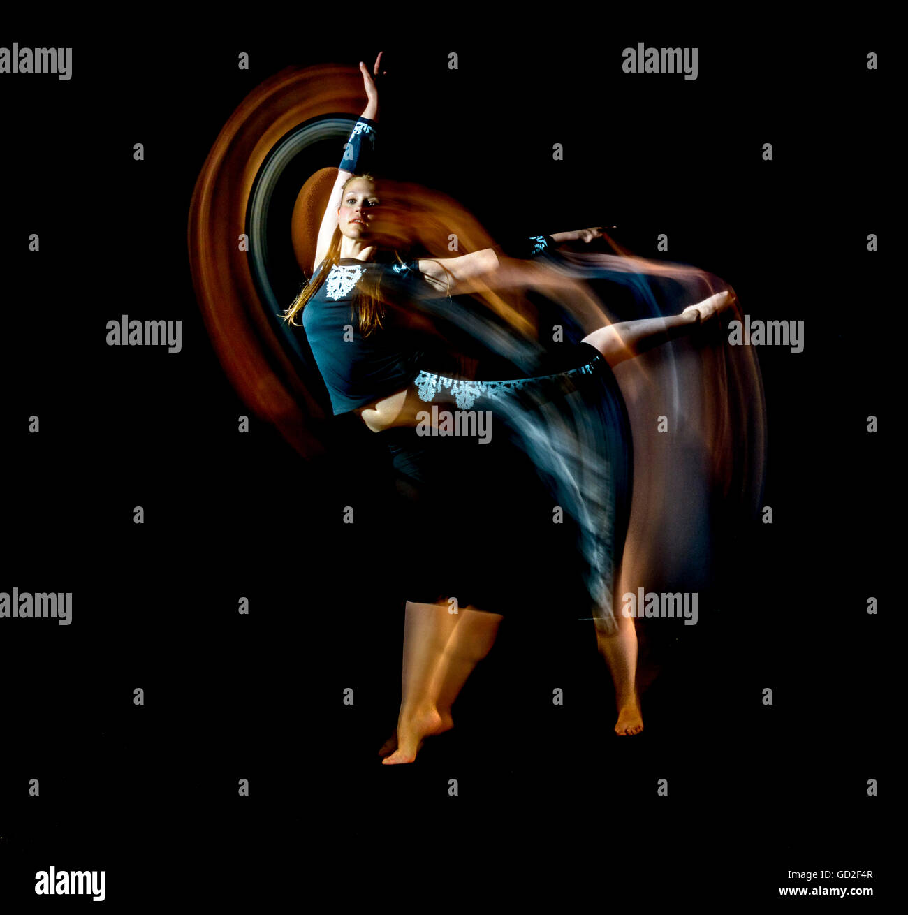 dancer woman jumping light movement blur Stock Photo - Alamy