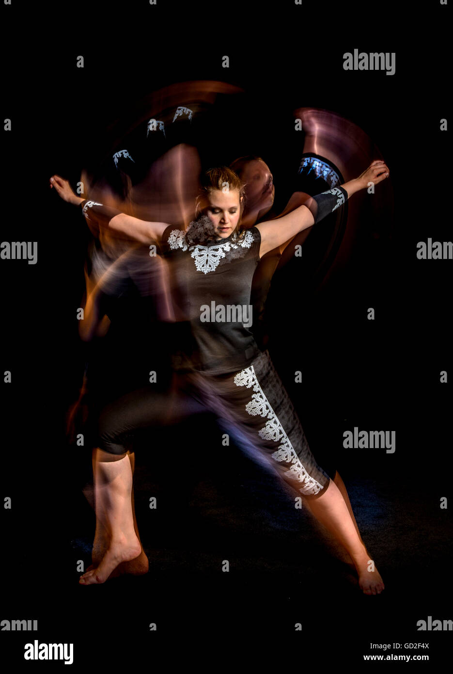 dancer woman light movement blur Stock Photo - Alamy