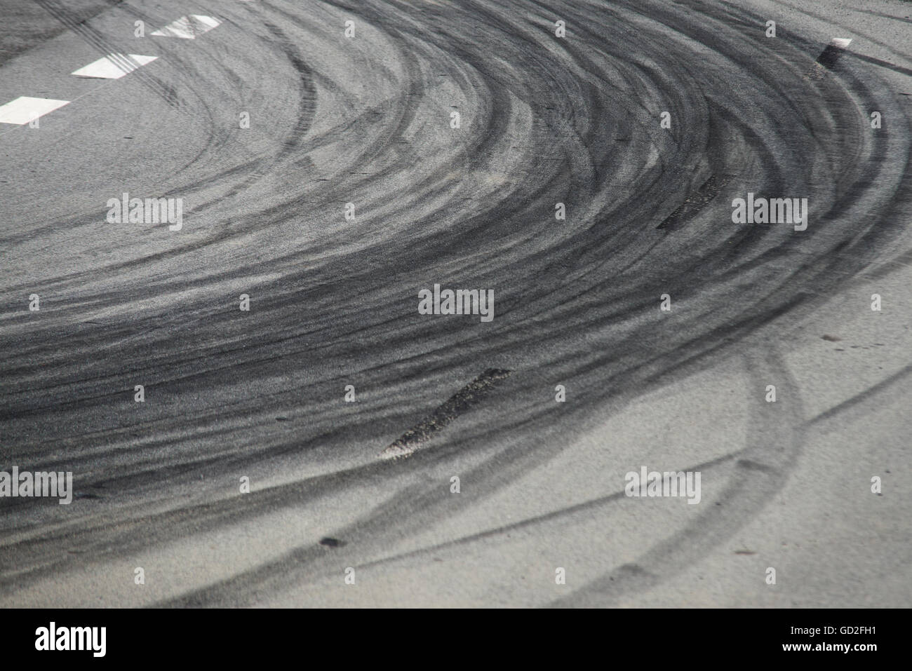 Tyre burnout marks on asphalt road Stock Photo - Alamy