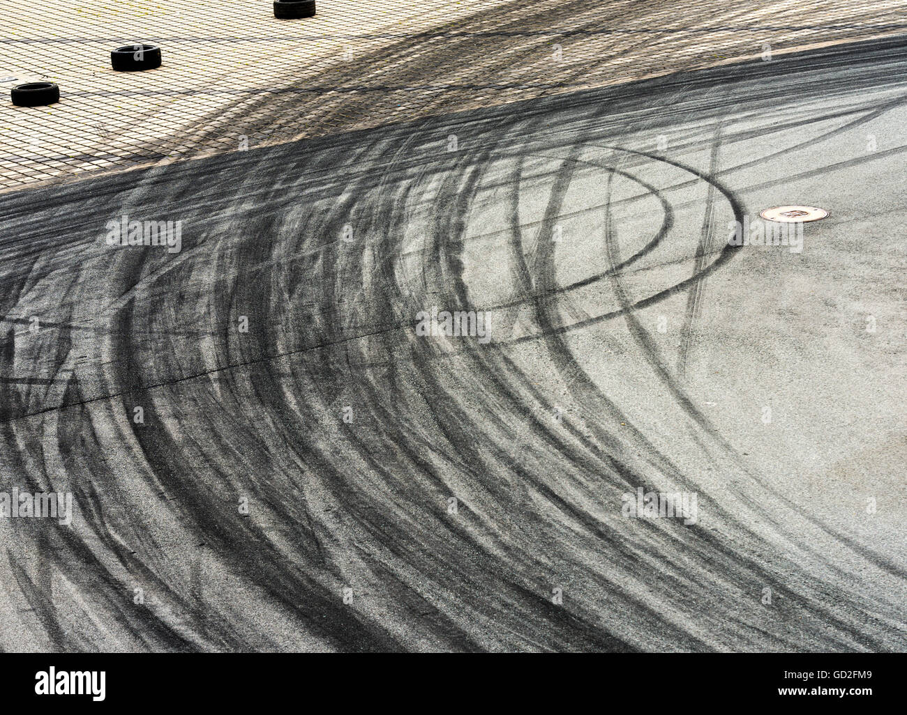 Tyre burnout marks on asphalt road Stock Photo - Alamy