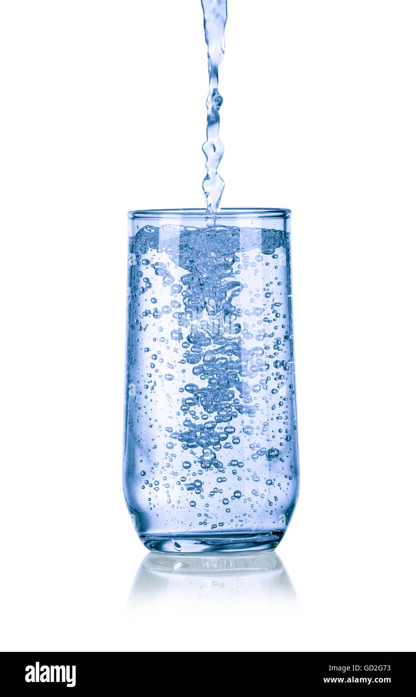 Pouring Water in a Glass Isolated on White Background Stock Photo - Alamy