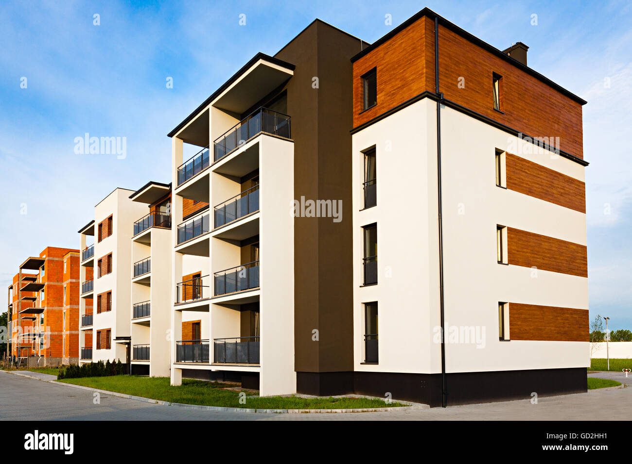 New block of apartment buildings stand in uninhabited suburb Stock ...