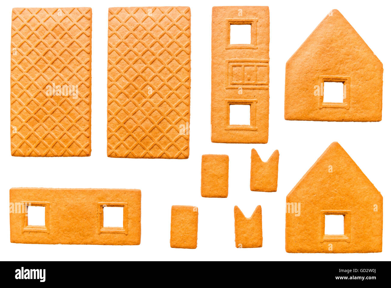 baked parts for build of Christmas gingerbread house on a white ...