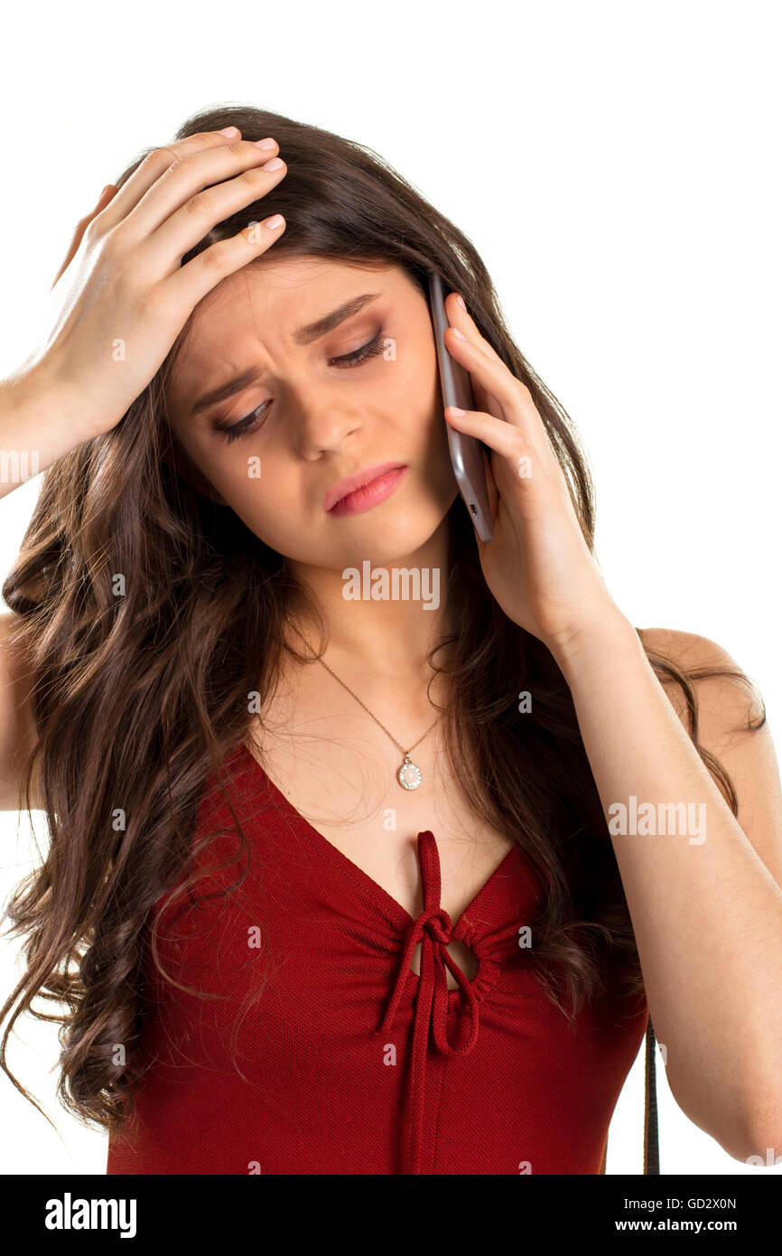Upset lady holds cell phone Stock Photo - Alamy