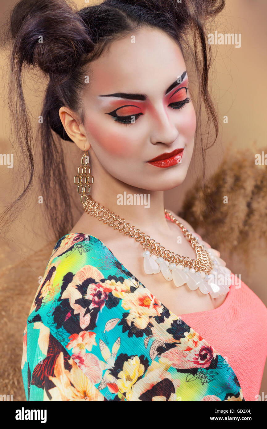 Stylized portrait of a Japanese geisha with bright make up Stock Photo ...