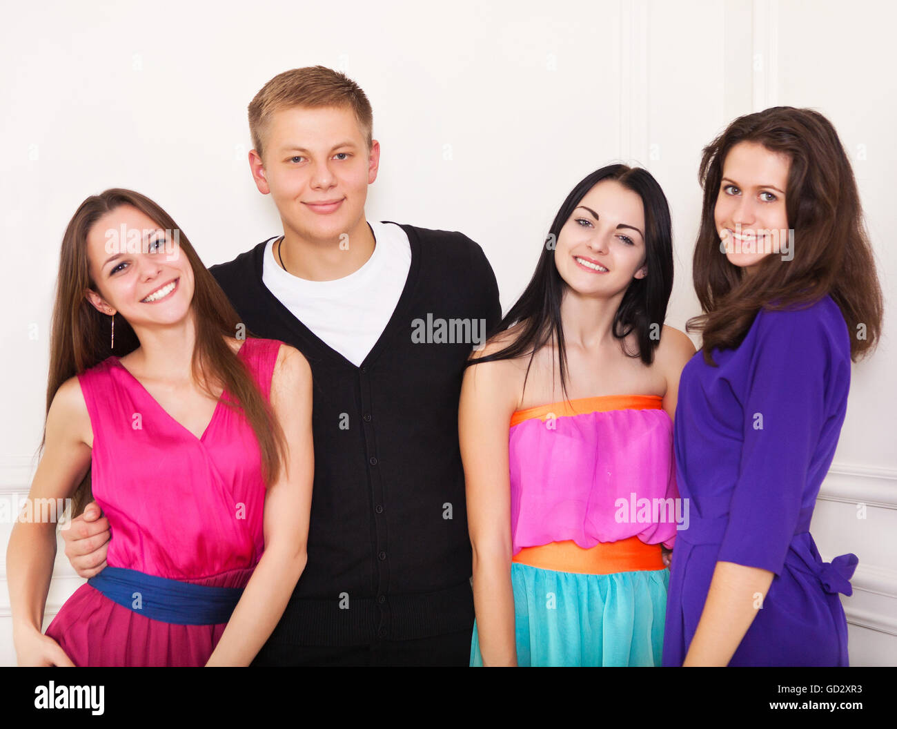 Four happy teen friends having fun together Stock Photo - Alamy