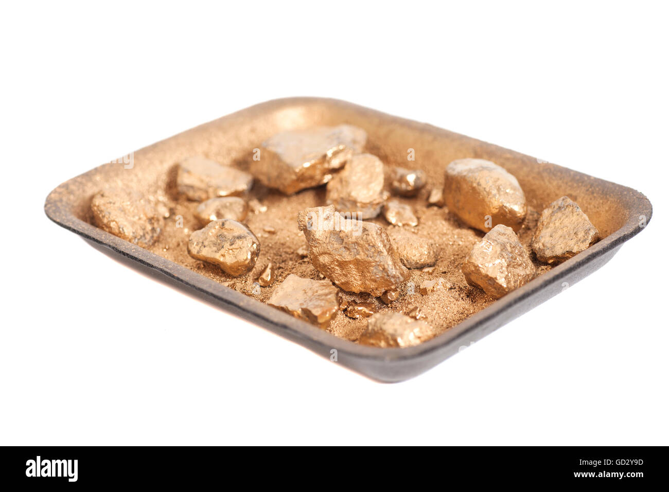 Golden nuggets on grungy wash pan with sand isolated on white ...