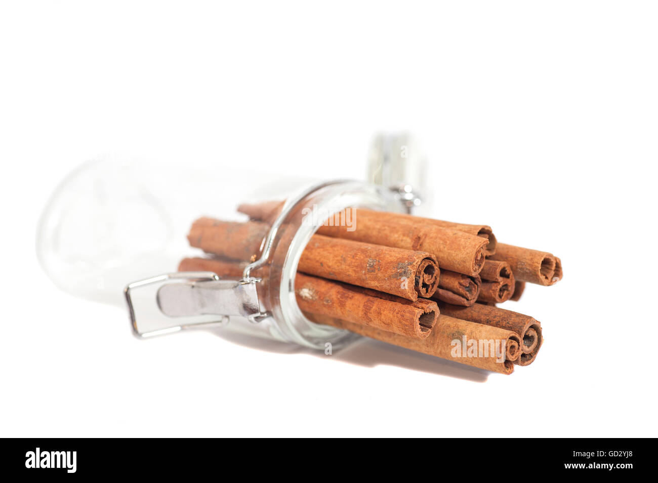 Cinnamon sticks in the Glass Isolated on White Background Stock Photo ...