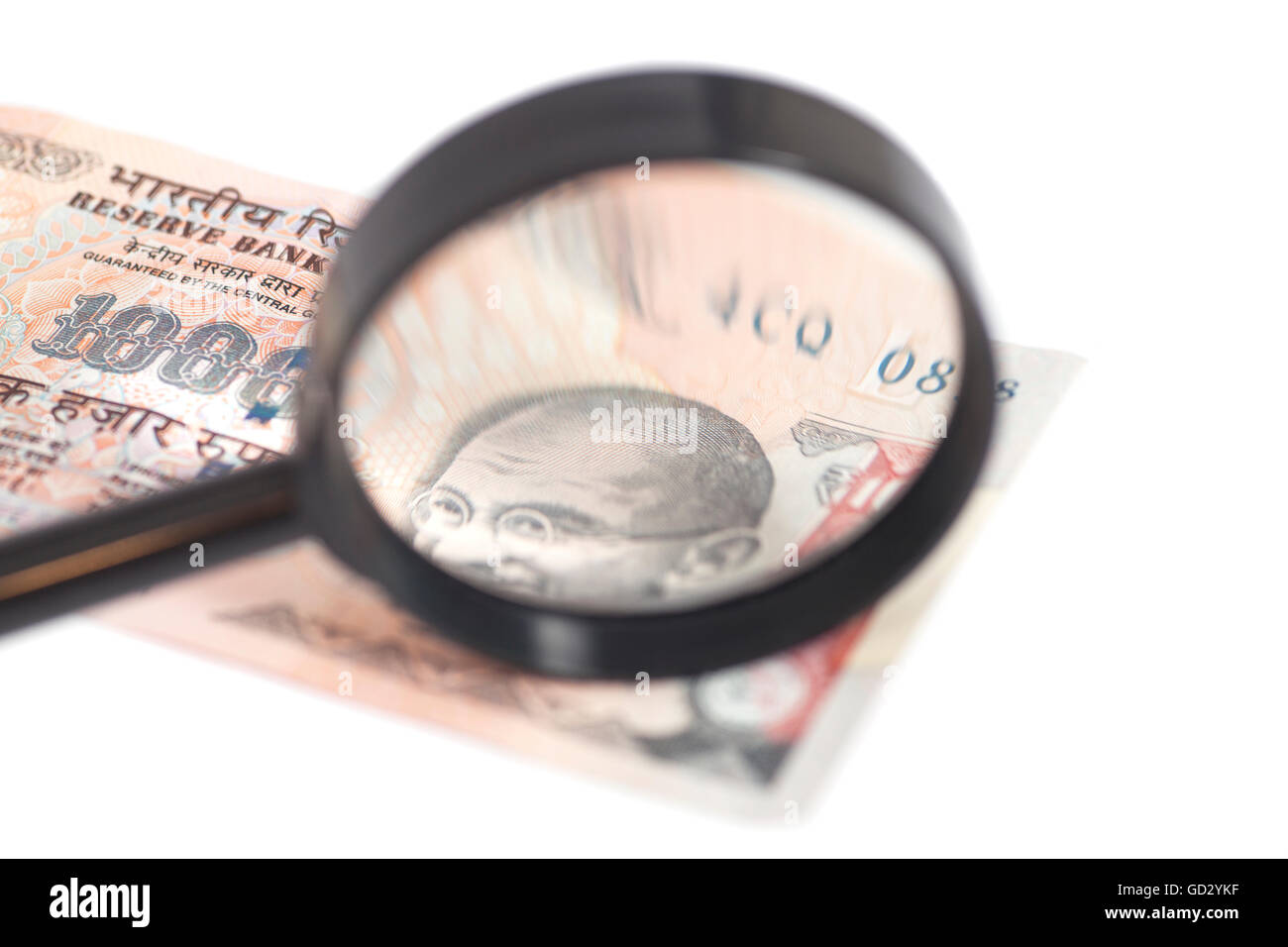 Indian Currency Rupee Note with magnifying glass isolated on white ...
