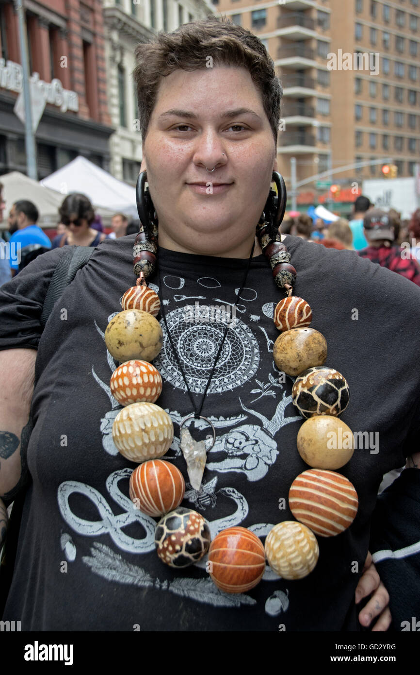 A lady from Brooklyn who practices witchcraft wearing a large Boa boa ...