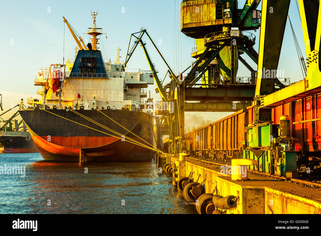 Big ship under unloading coal in Port of Gdansk, Poland Stock Photo - Alamy