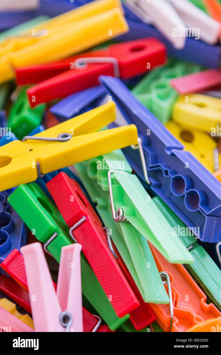 heap of plastic laundry clothespin in different vivid colors Stock ...