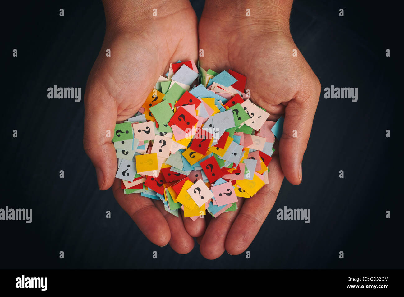 Too Many Questions. Pile of colorful paper notes with question marks in ...