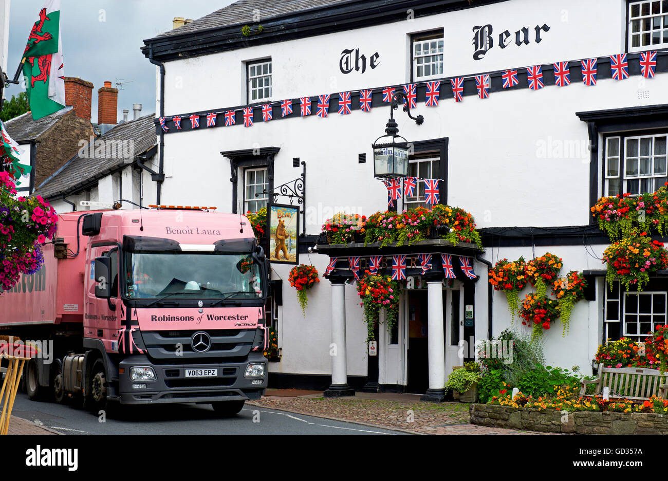 Lorry passing the Bear pub, in the village of Crickhowell, Powys, Wales ...