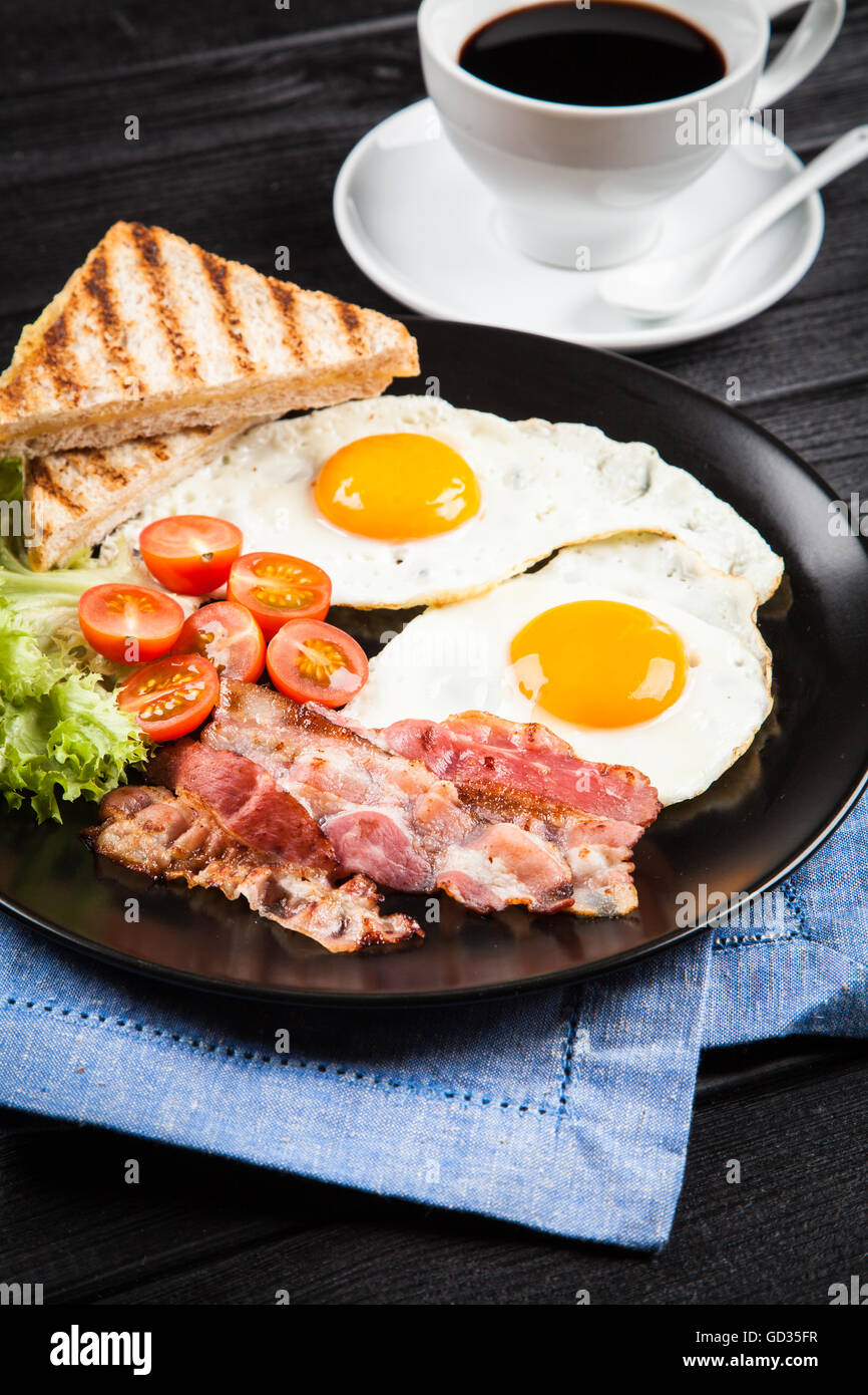Traditional breakfast on a plate Stock Photo - Alamy