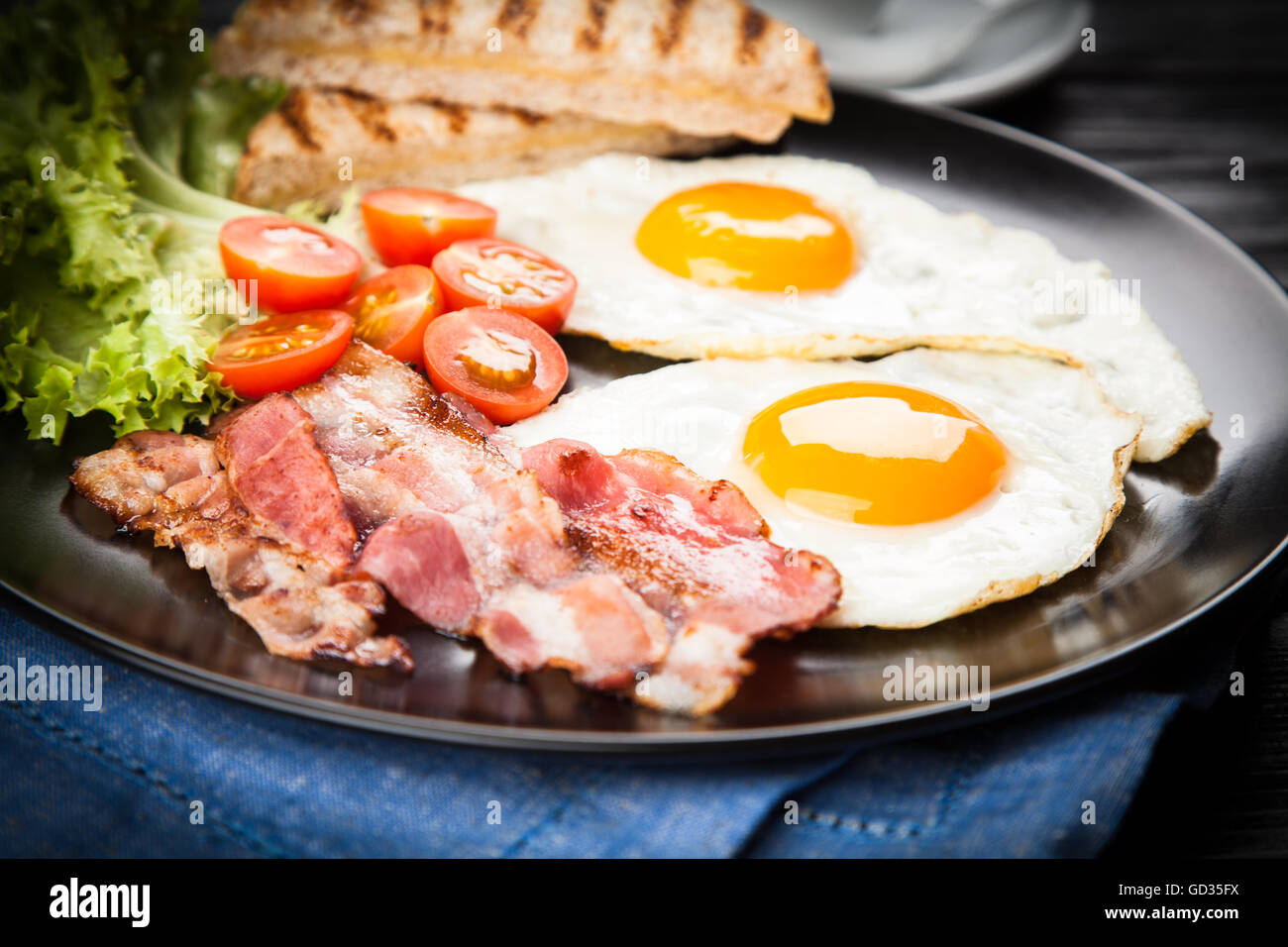 Traditional breakfast on a plate Stock Photo - Alamy