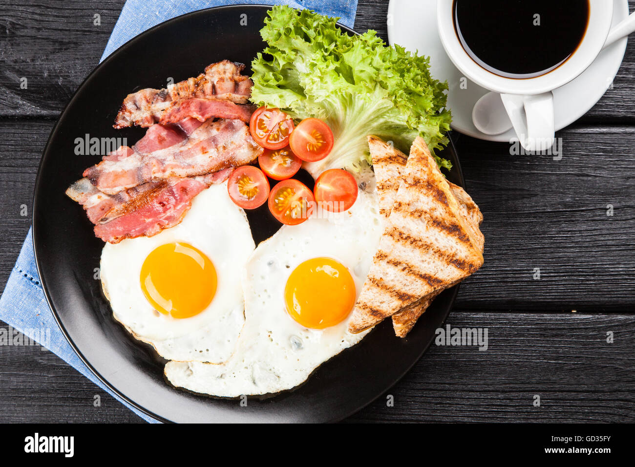 Traditional breakfast on a plate Stock Photo - Alamy