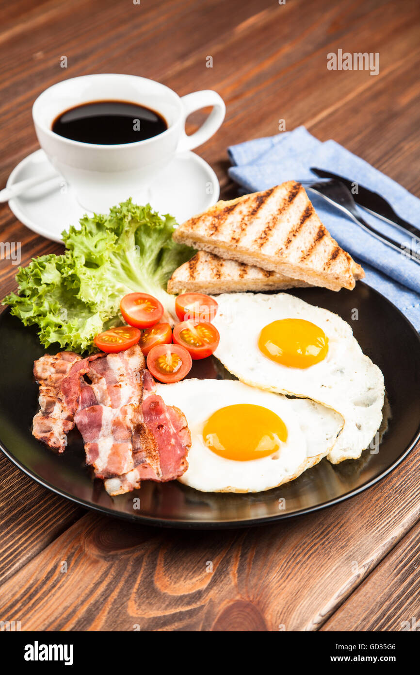 Traditional breakfast on a plate Stock Photo - Alamy