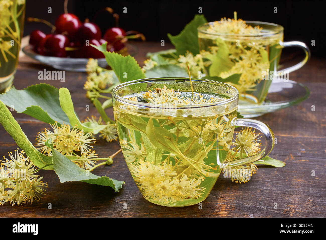 Two glass cup of linden tea with fresh flowers Stock Photo - Alamy