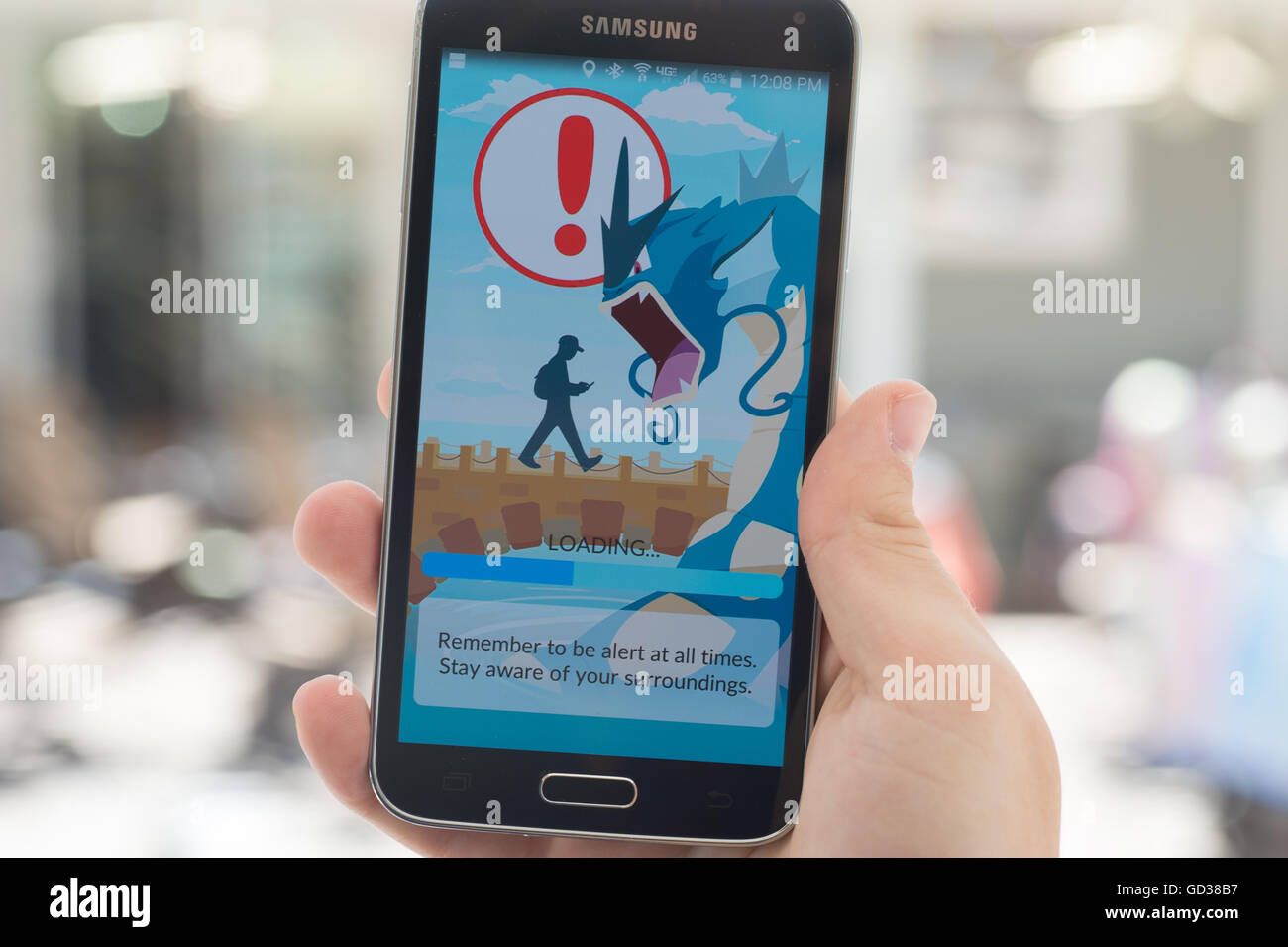 Android user plays Pokemon Go, a free-to-play augmented reality mobile ...