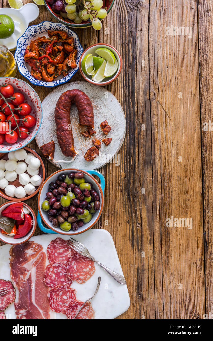 tapas border background on rustic table Stock Photo - Alamy
