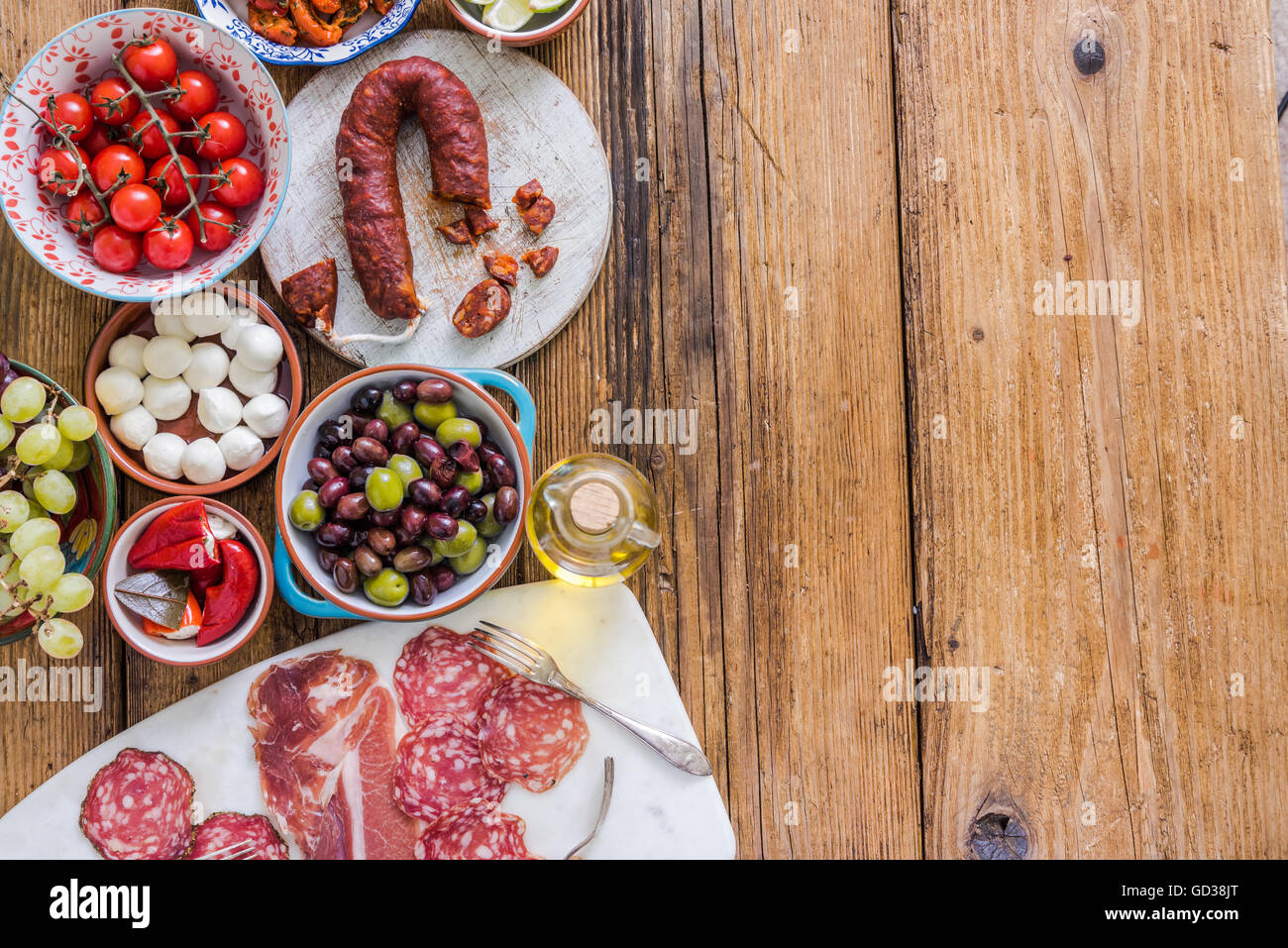 tapas border background on rustic table Stock Photo - Alamy