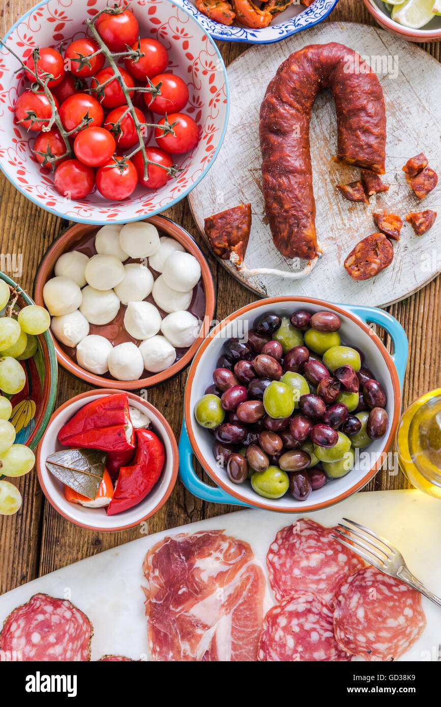 tapas selection overhead view on table Stock Photo - Alamy