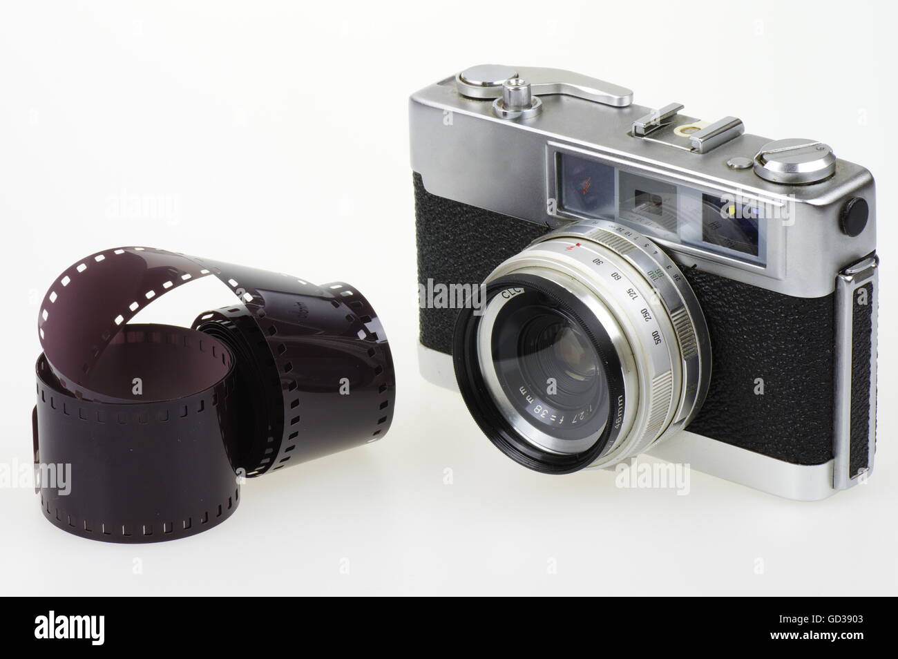 Old rangefinder analog camera system 135 and the photographic film on ...