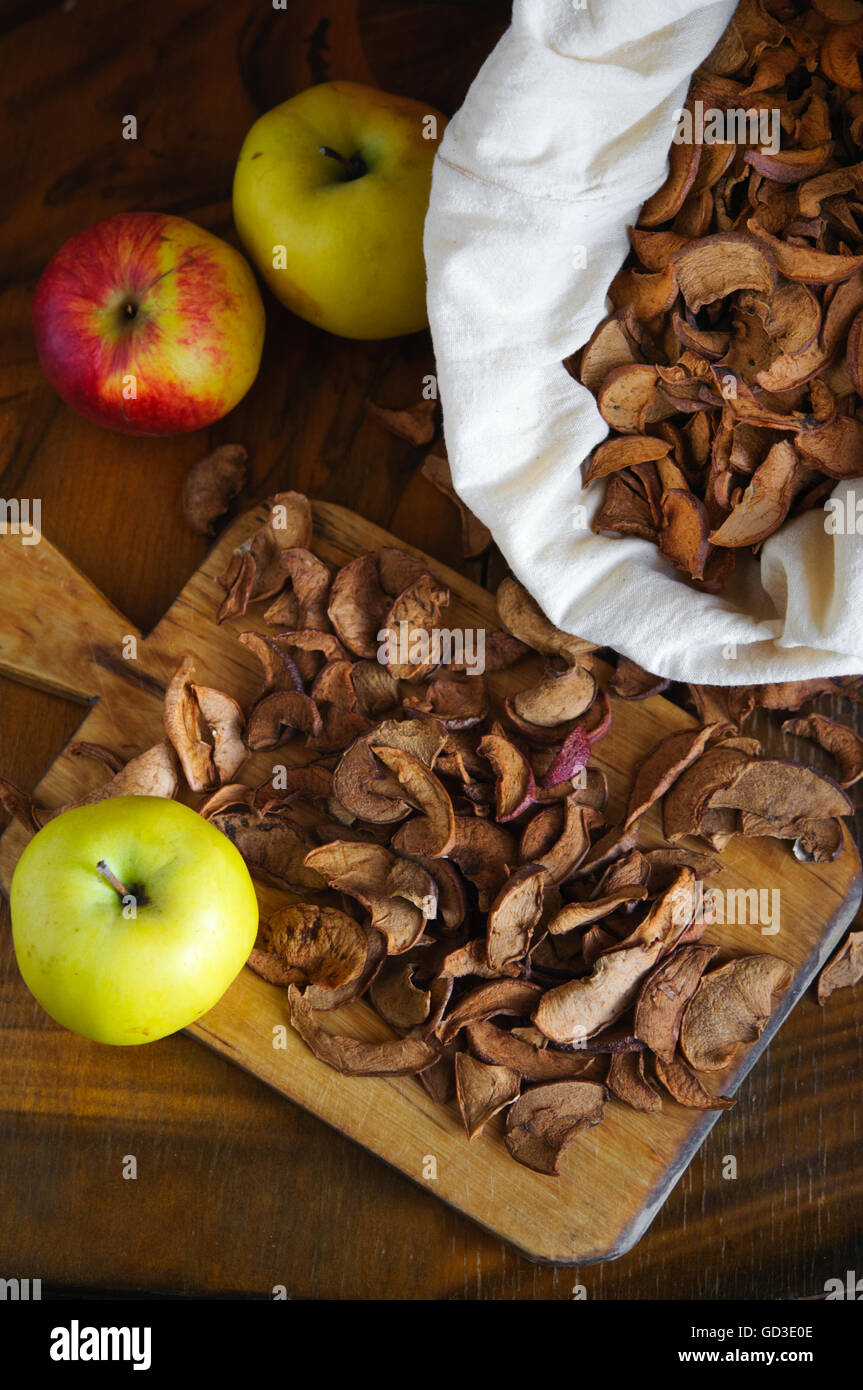 Dried apples on wooden board Stock Photo - Alamy