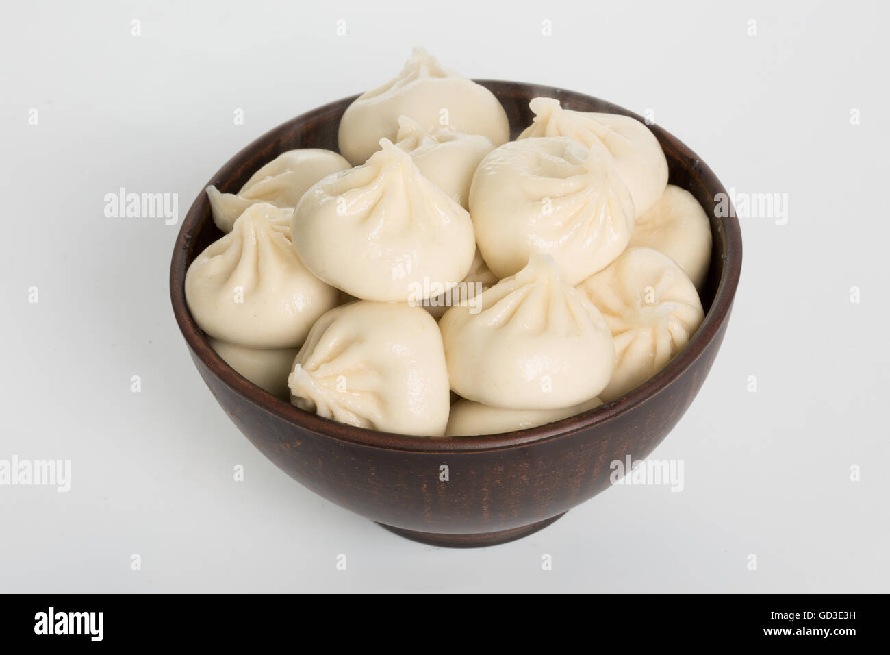 Traditional georgian khinkali cooked in hi-res stock photography and ...