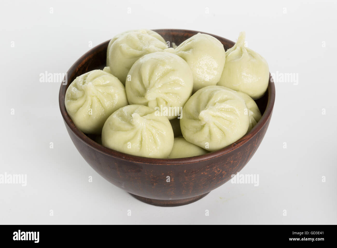 khinkali cooked on a ceramic plate Stock Photo - Alamy