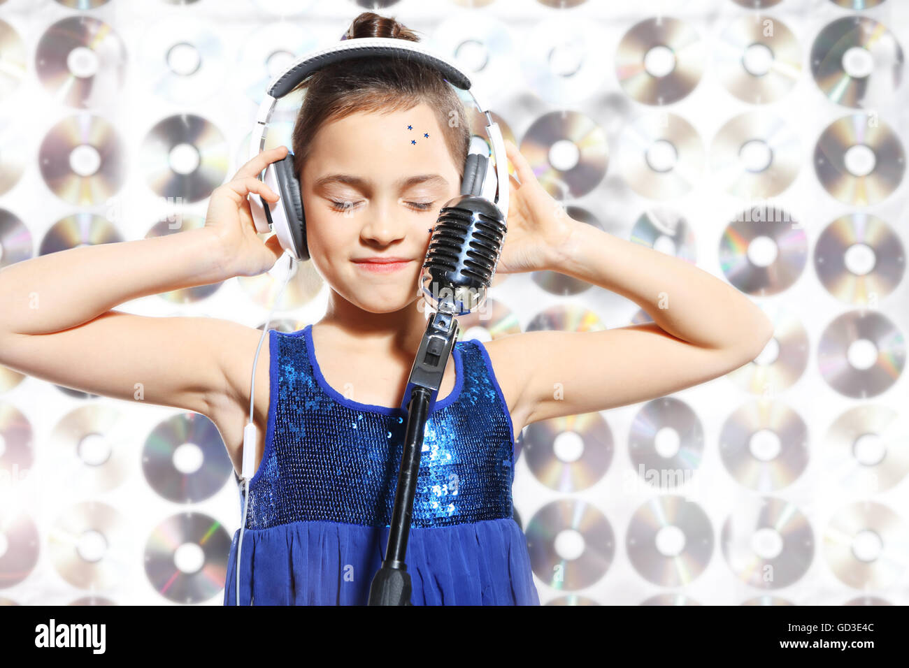 Child teen girl singing microphone hi-res stock photography and images ...