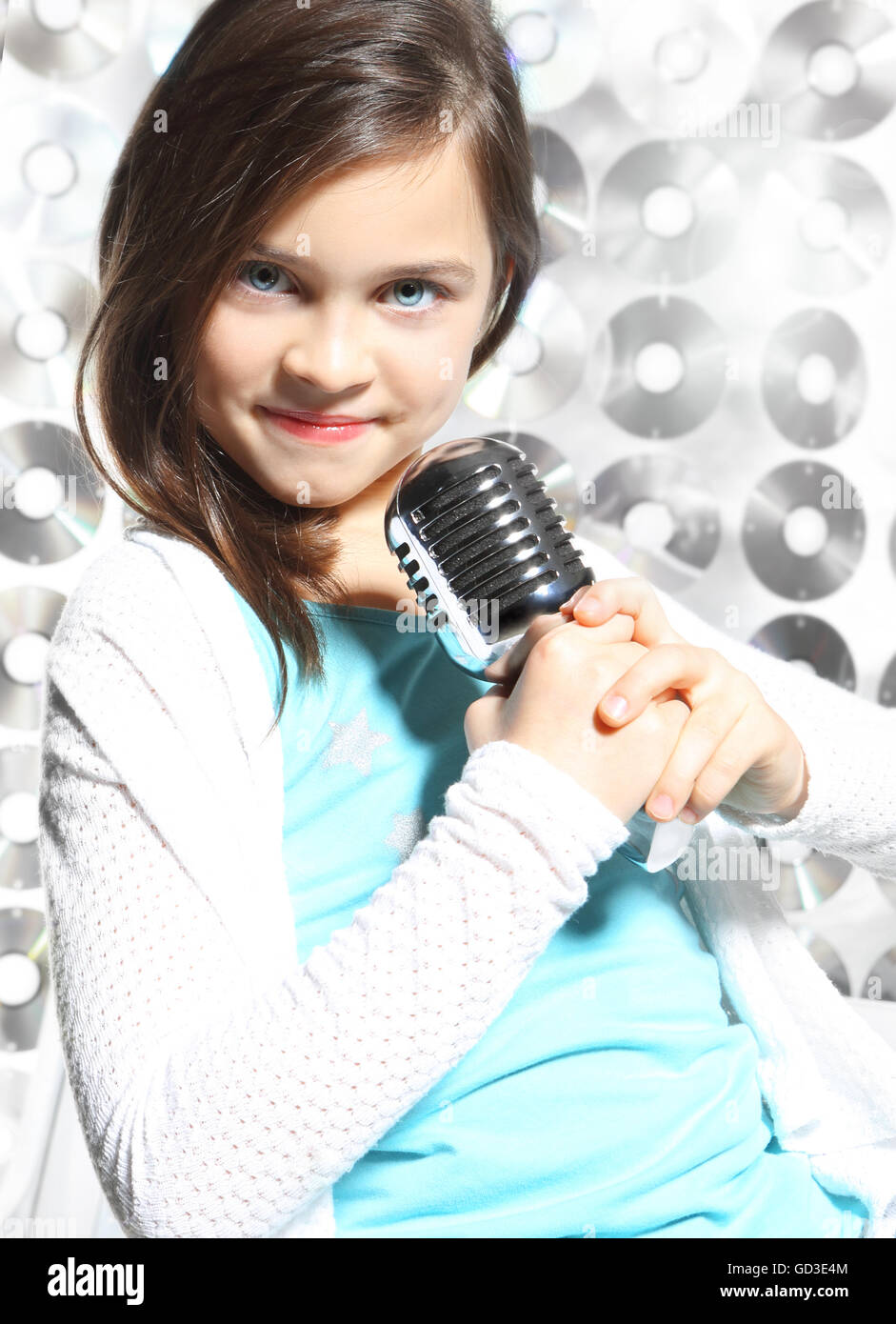 Child teen girl singing microphone hi-res stock photography and images - Alamy