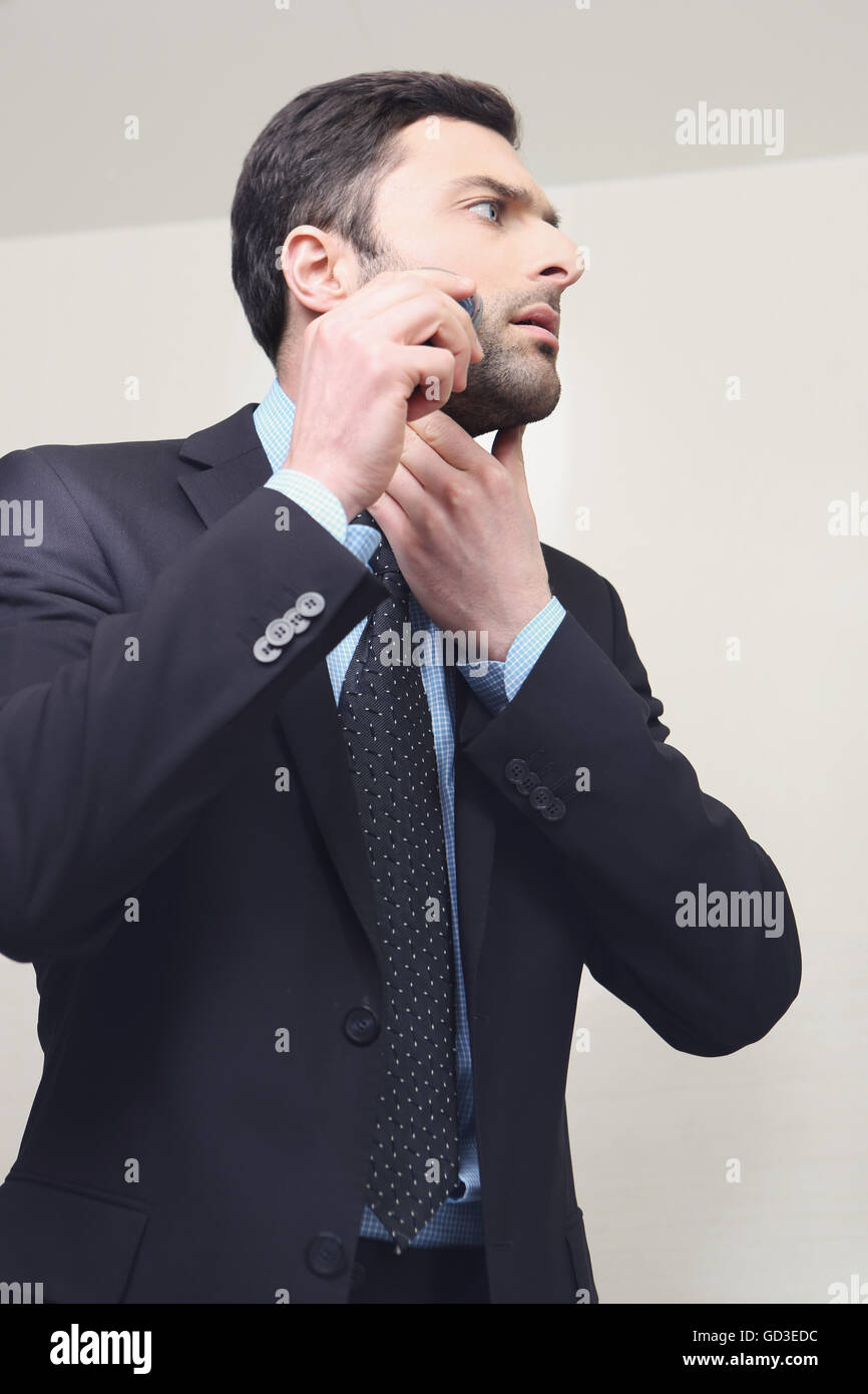 Businessman shaving hi-res stock photography and images - Alamy