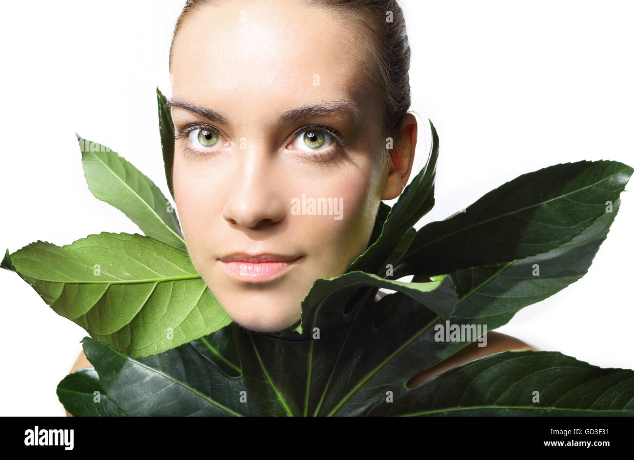 Natural woman in the collar of the leaf Stock Photo - Alamy