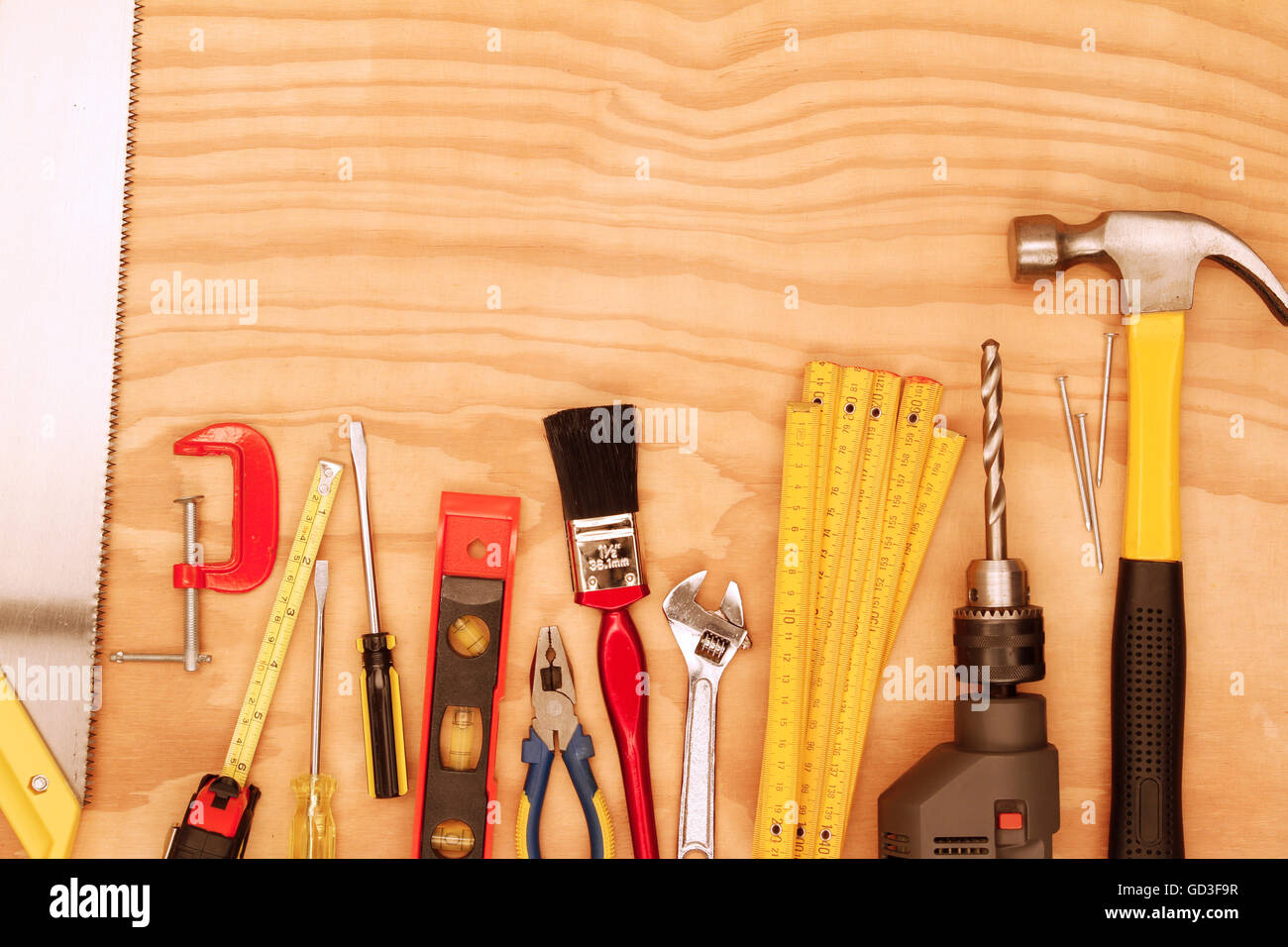 Assorted work tools on wood Stock Photo - Alamy