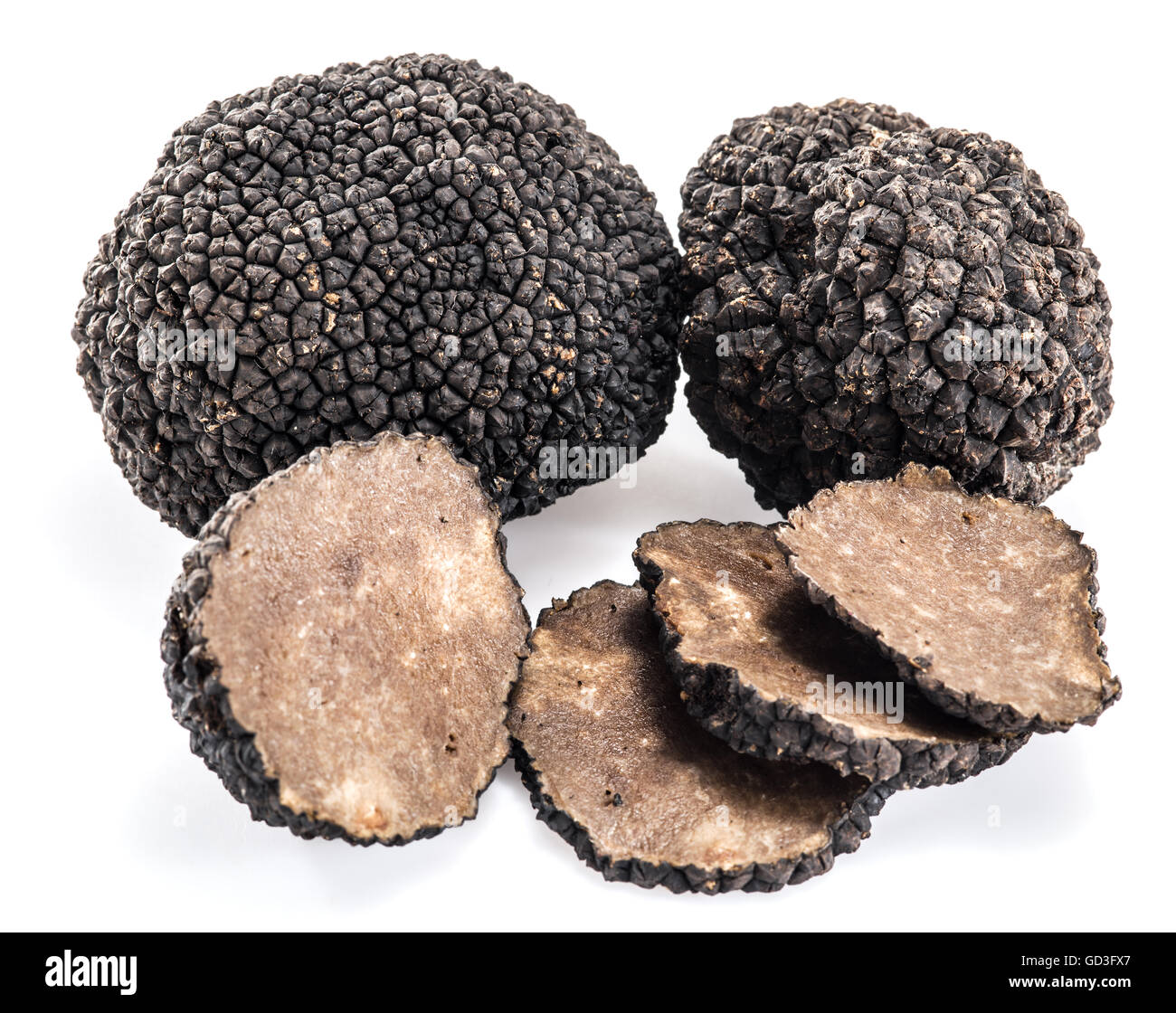 Black truffles isolated on a white background Stock Photo - Alamy