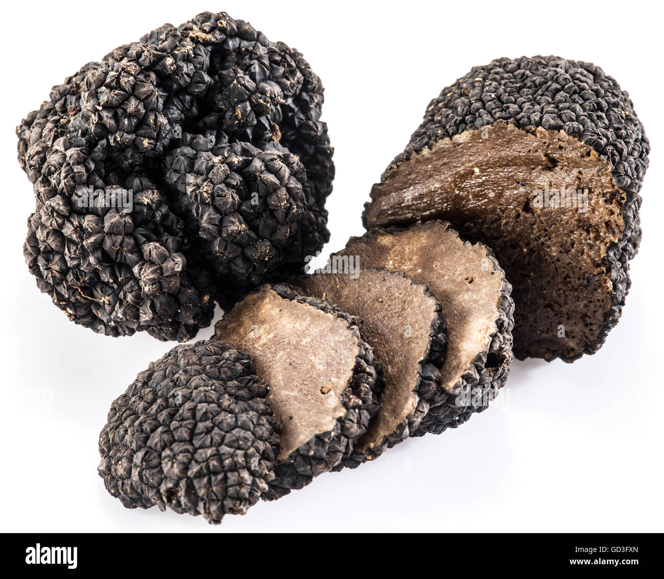 Black truffles isolated on a white background Stock Photo - Alamy