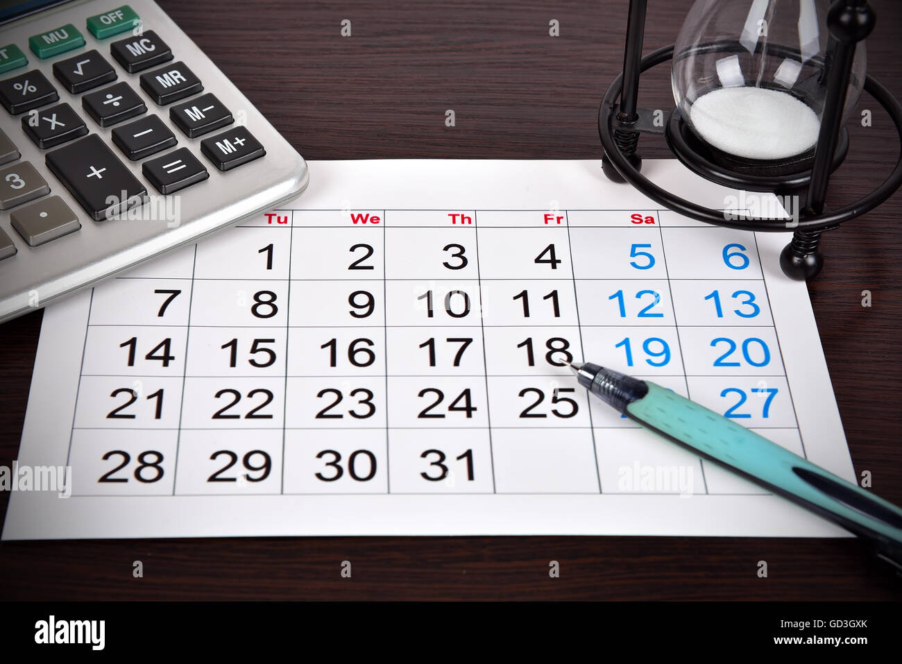 dates on calendar page on table, close up Stock Photo - Alamy