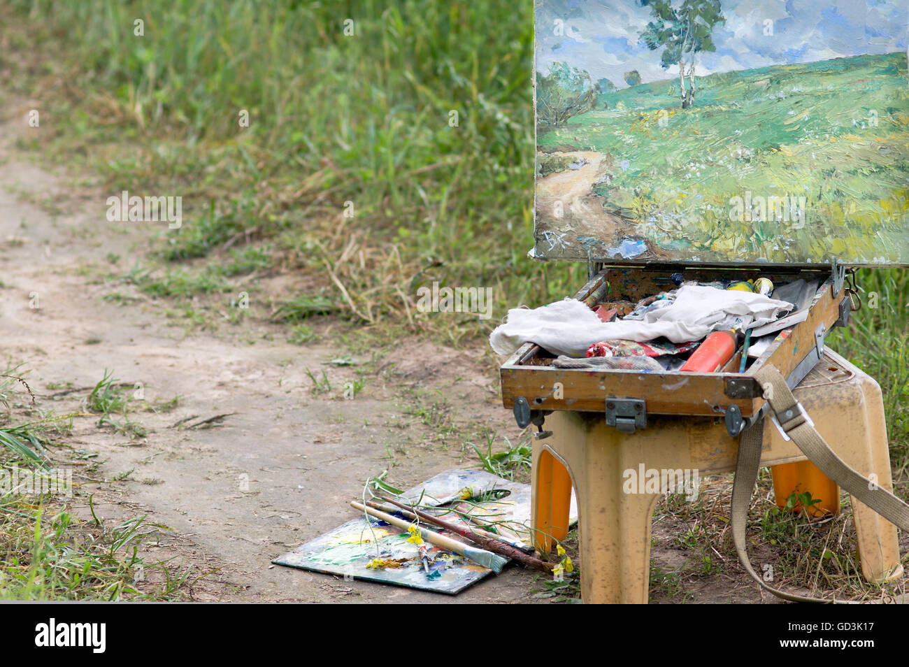 An open easel laid on the ground with a artwork, cropped shot Stock ...