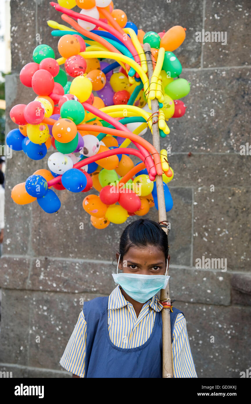 Girl selling balloons hi-res stock photography and images - Alamy