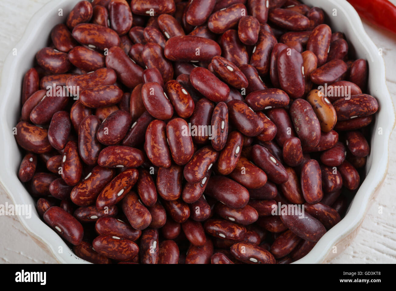 Dry kidney in the bowl on wood background Stock Photo - Alamy