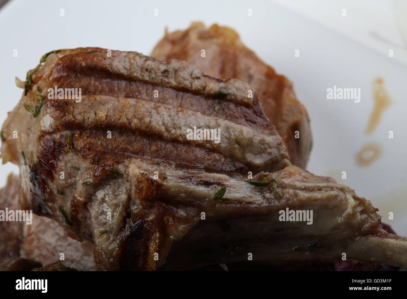 Lamb Frenched Rack grilled rib bone Stock Photo - Alamy