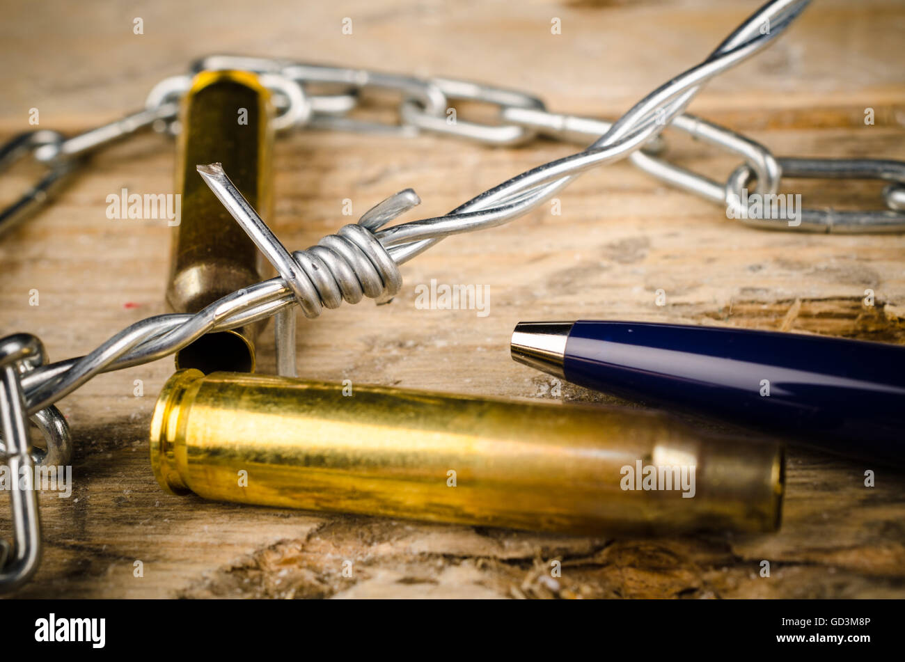 Bullets and barbed wire around a pen, a press freedom concept Stock ...