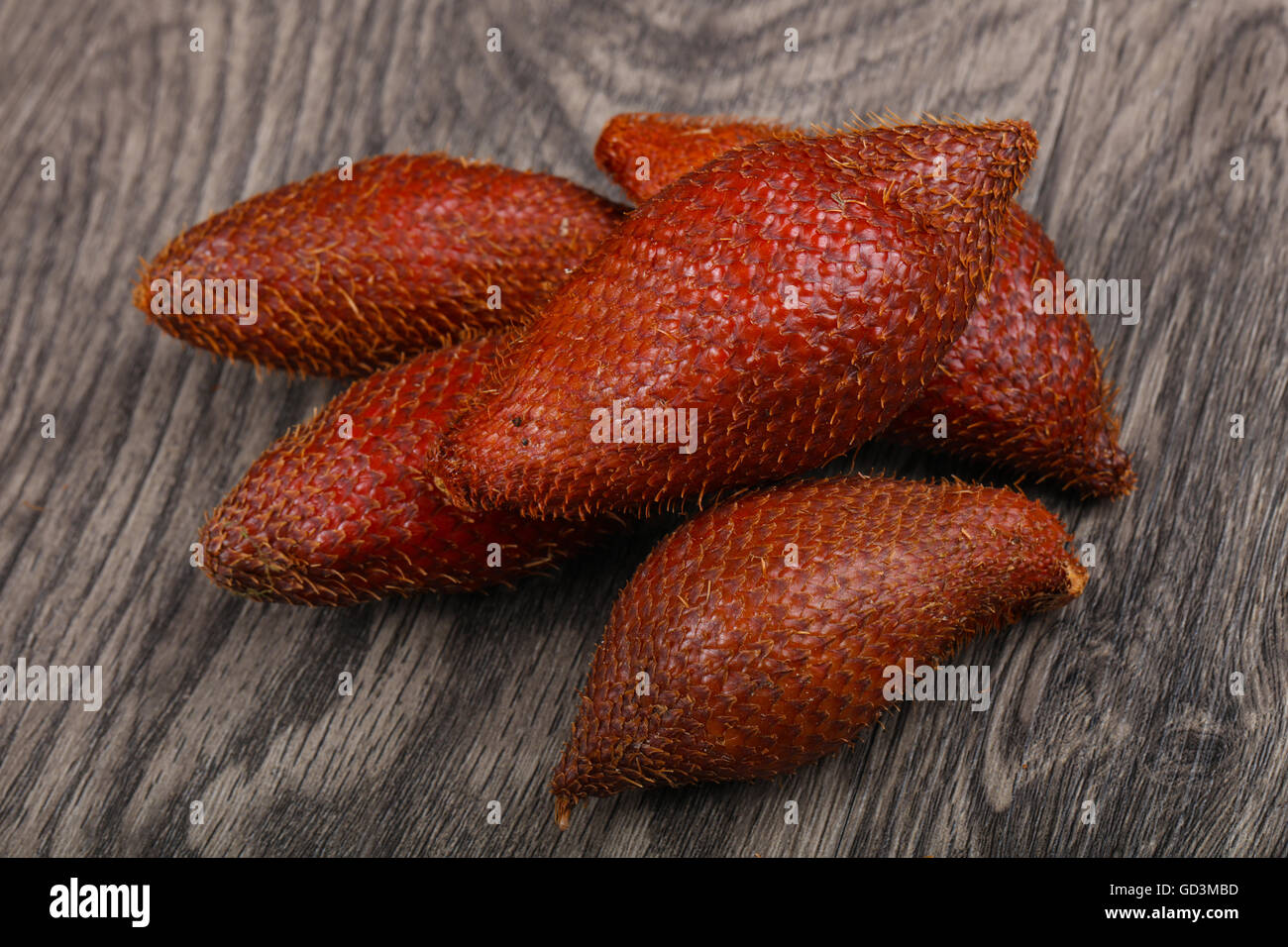Asian fruit - sala on the wood background Stock Photo - Alamy